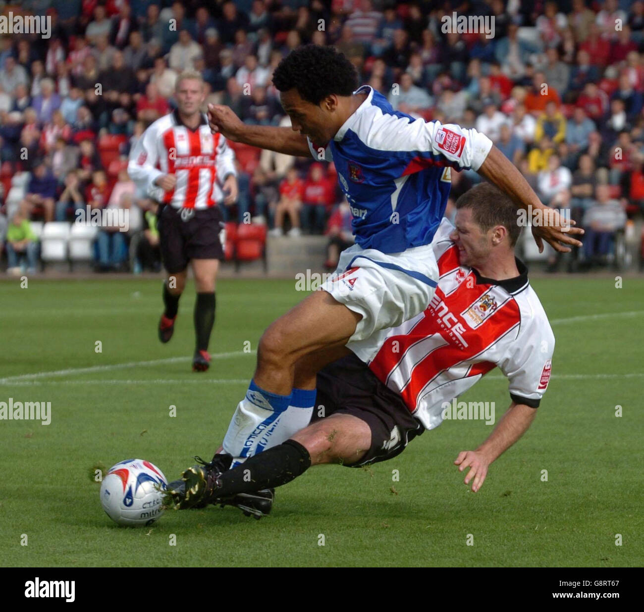 Hard soccer tackle hi-res stock photography and images - Alamy