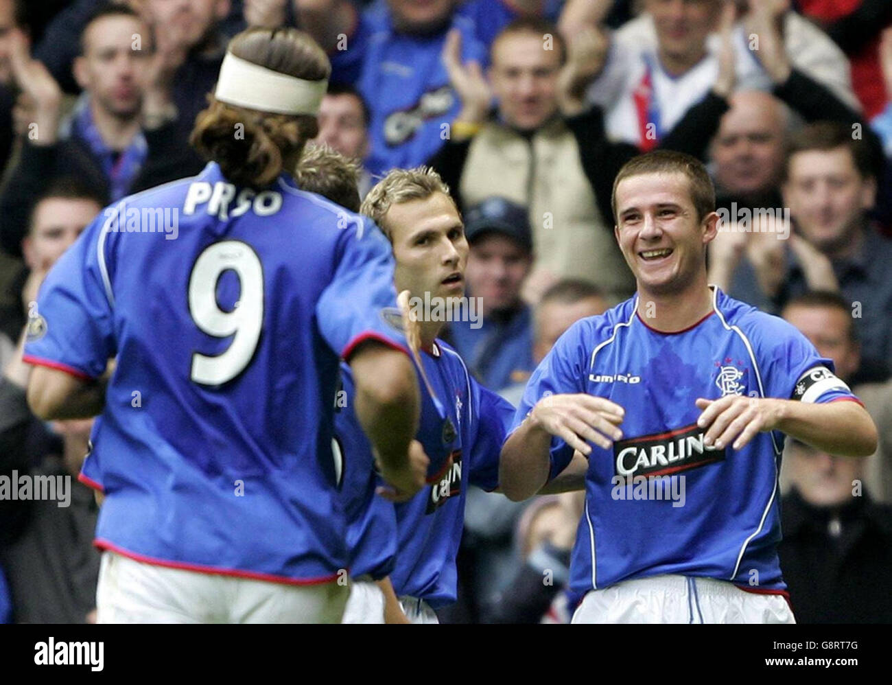 Rangers' Barry Ferguson (R) celebrates scoring their second goal during ...