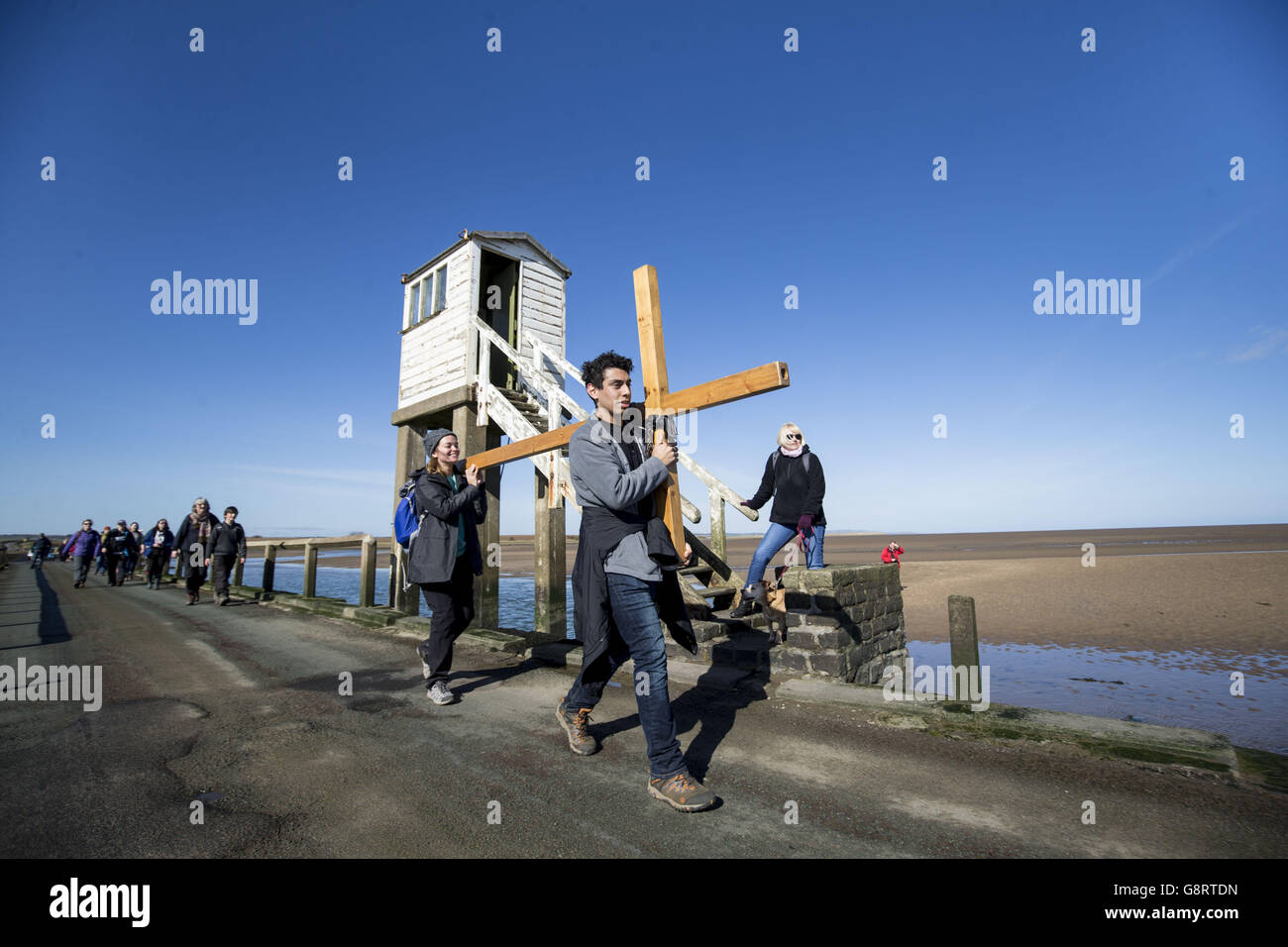 Pilgrims carry a cross on the final leg of the Northern Cross ...