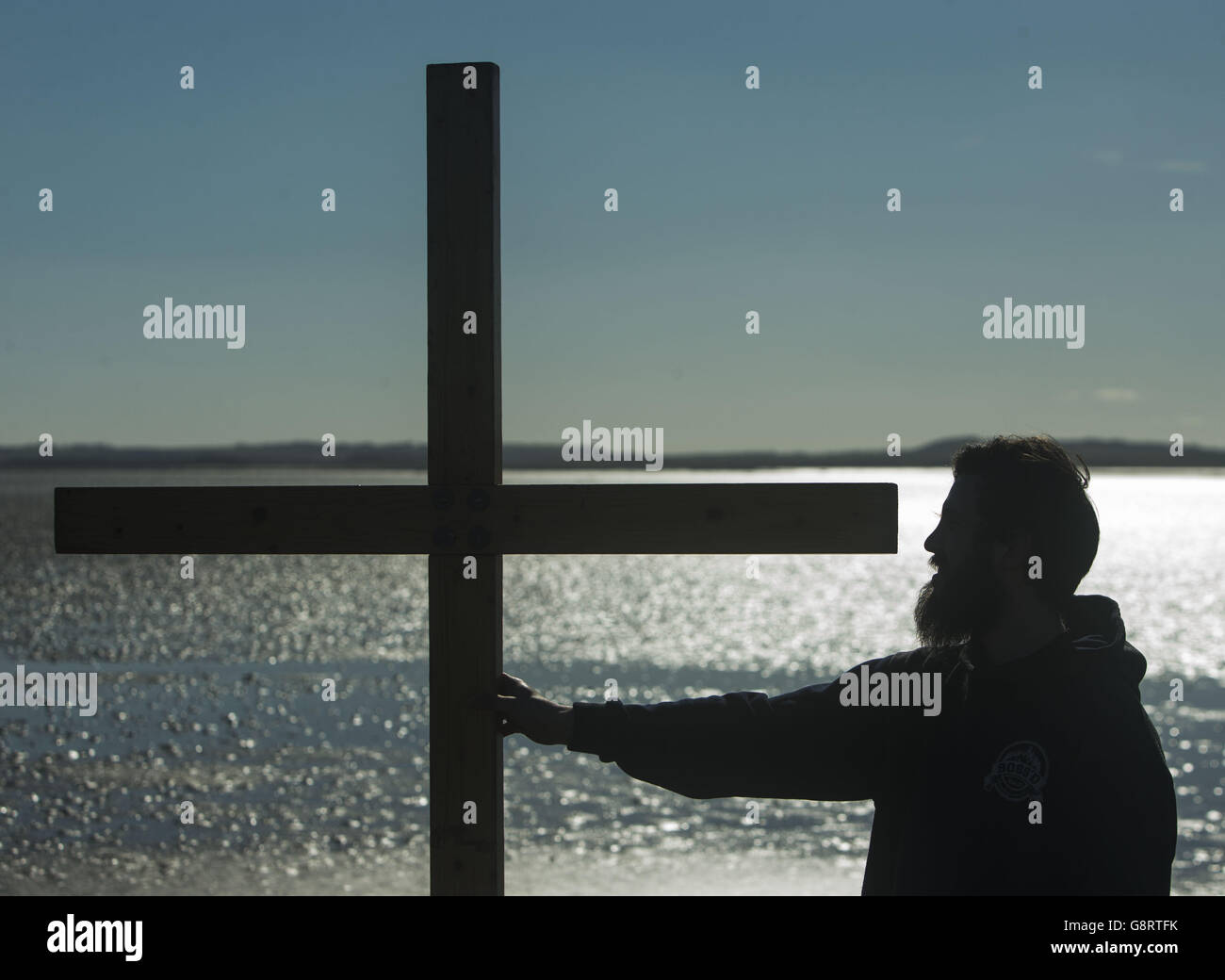 Pilgrims carry a cross on the final leg of the Northern Cross ...