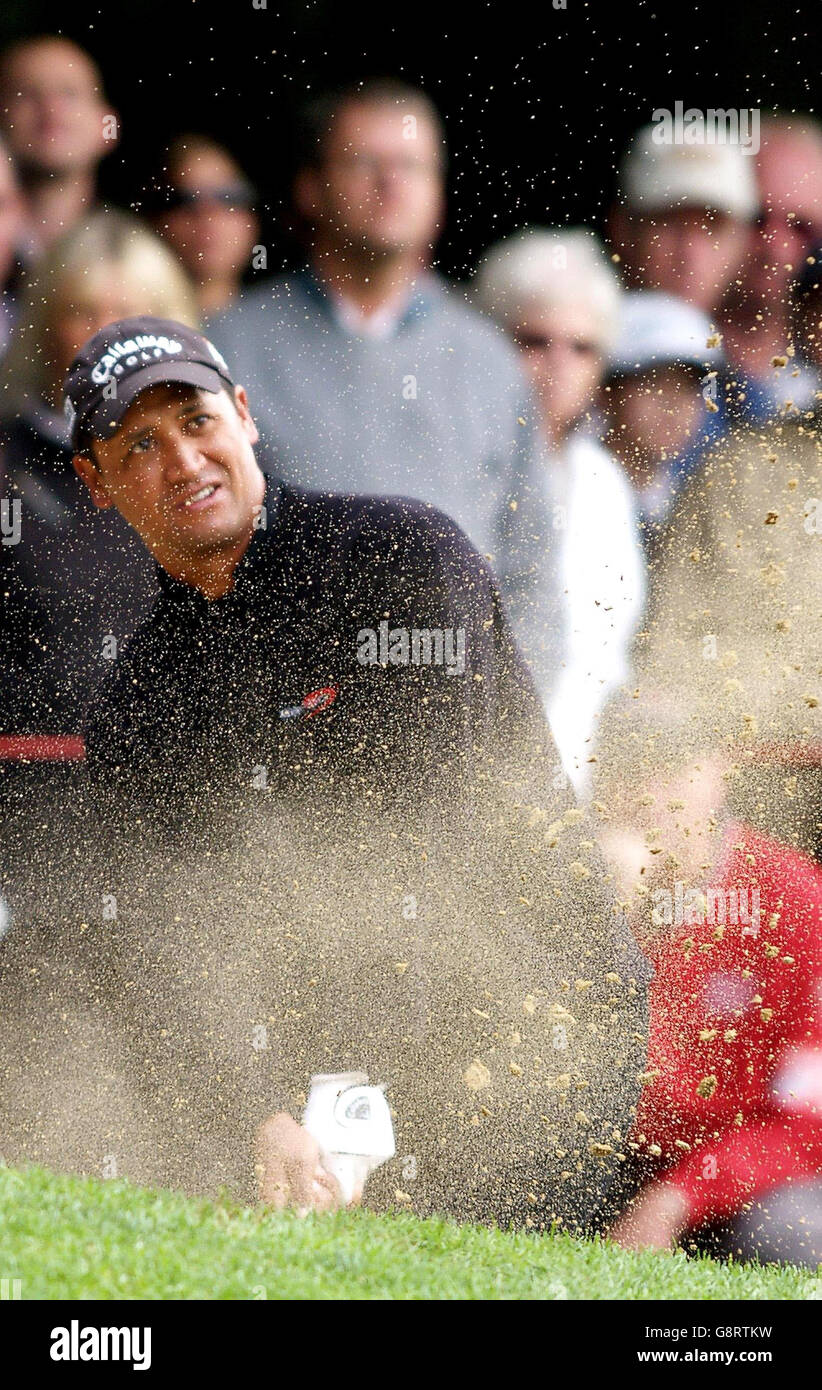 New Zealand's Michael Campbell follows the flight of his ball out of a ...