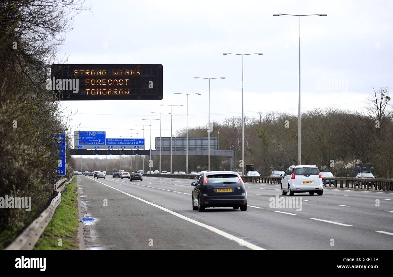 A matrix sign warns motorists on the M4 motorway about high winds ...