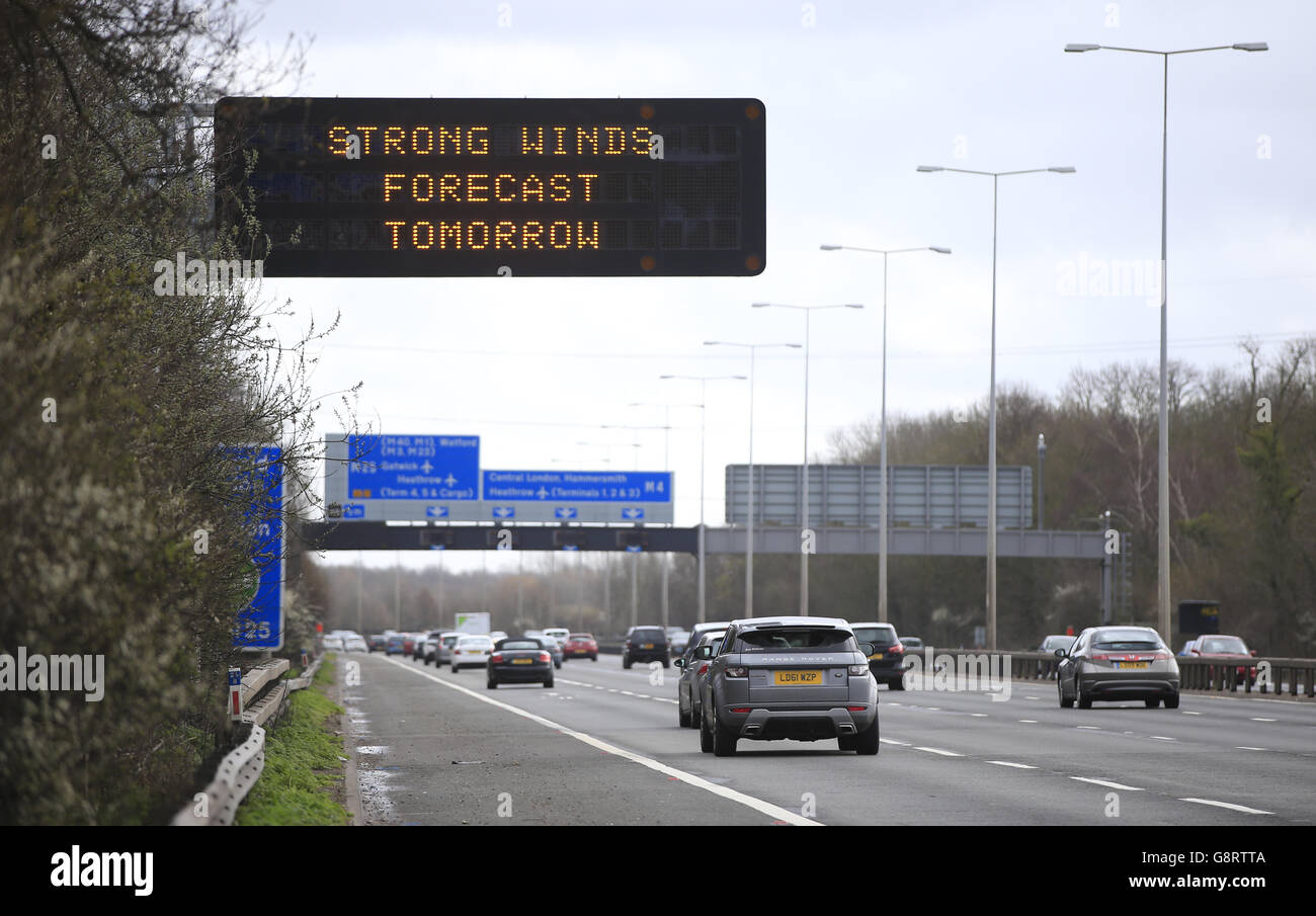A matrix sign warns motorists on the M4 motorway about high winds ...