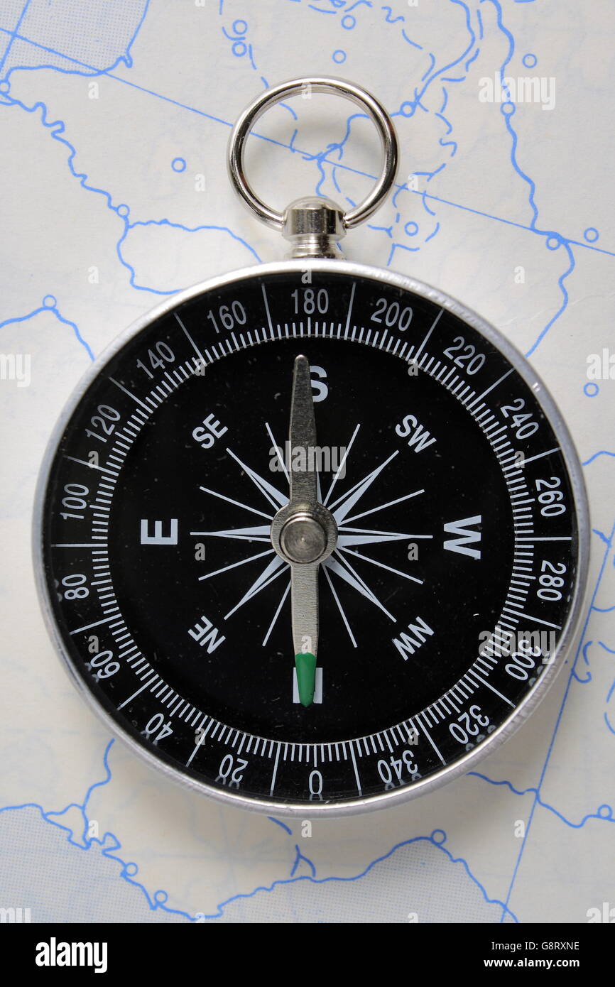 Old compass on map hi-res stock photography and images - Alamy
