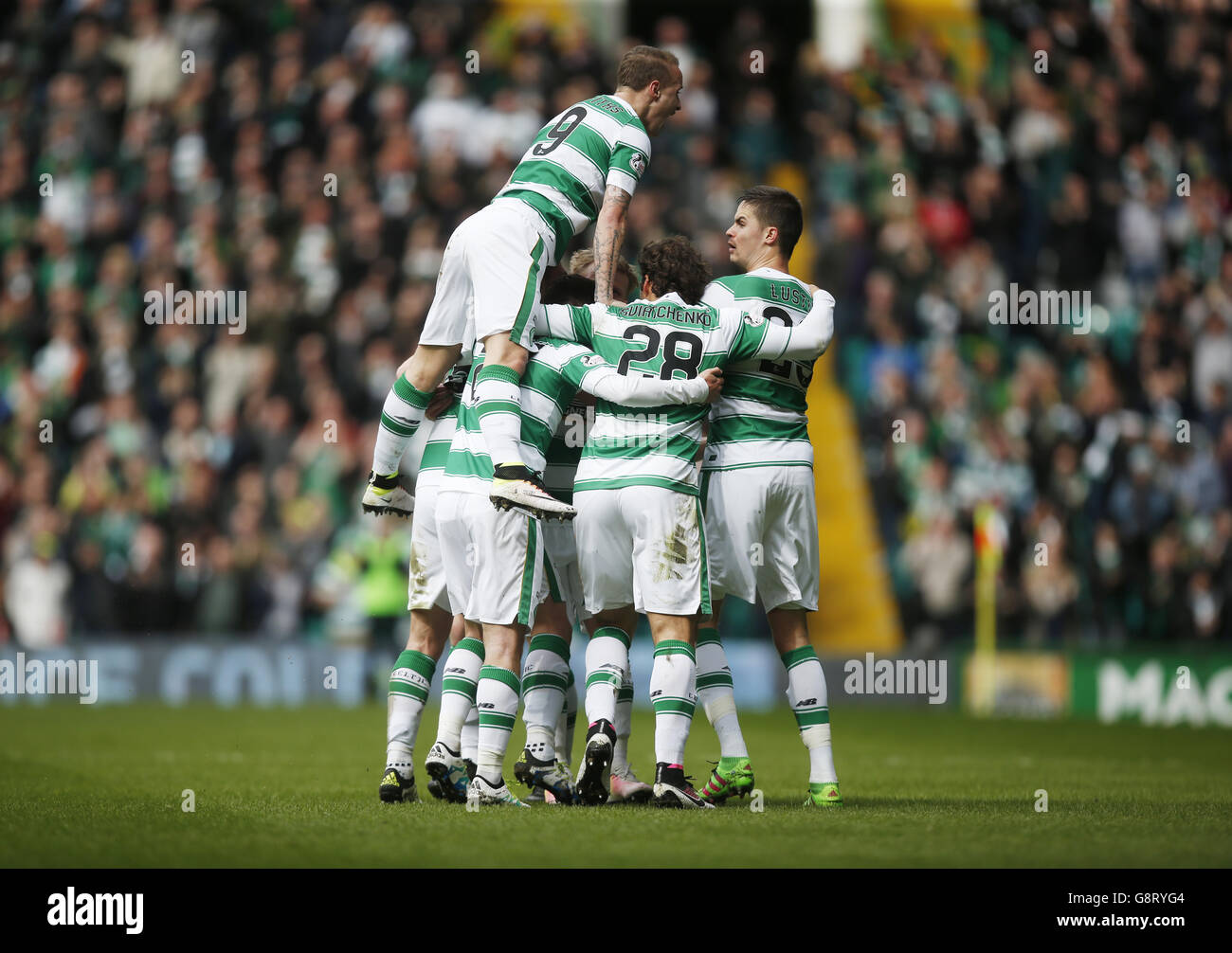 Celtic's Gary Mackay-Steven (hidden from view) celebrates scoring his ...
