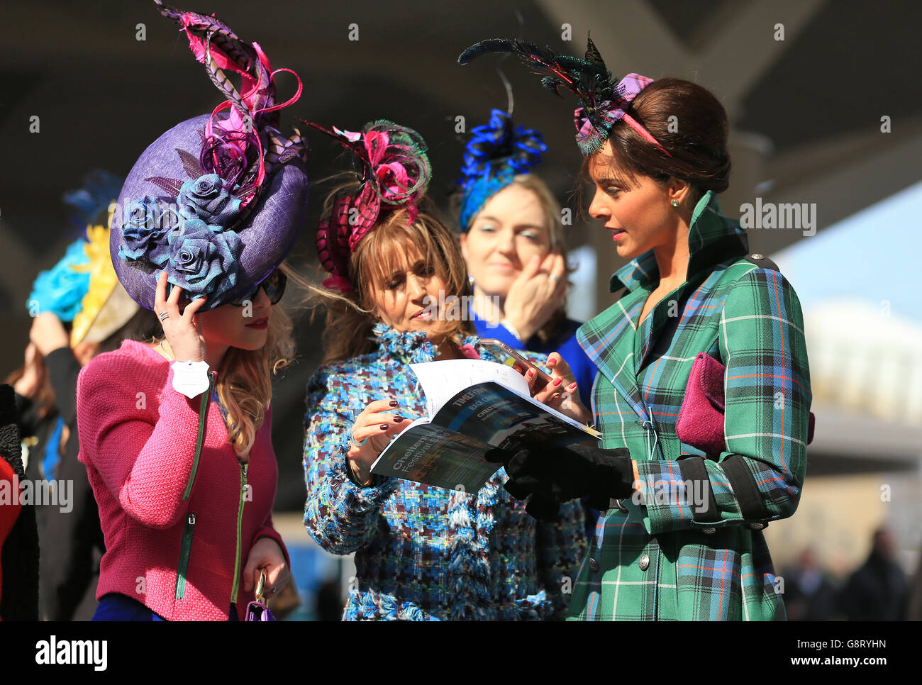 Female racegoers in fancy hats during Ladies Day of the 2016 Cheltenham ...