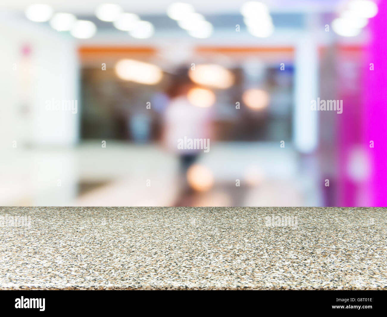 Marble empty table in front of blurred mall Stock Photo - Alamy