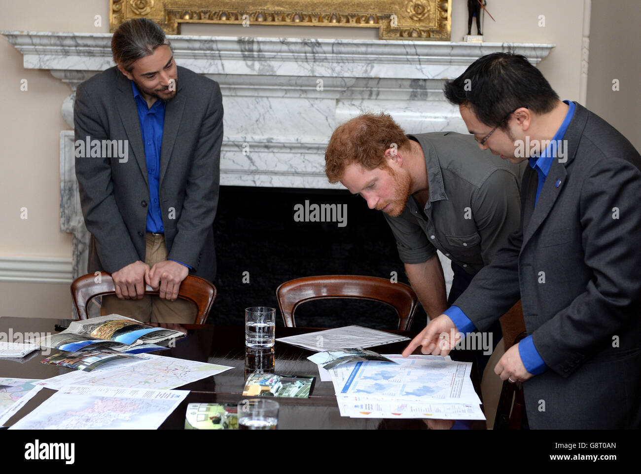 Prince Harry, royal patron of MapAction, speaks with volunteers Hamish ...
