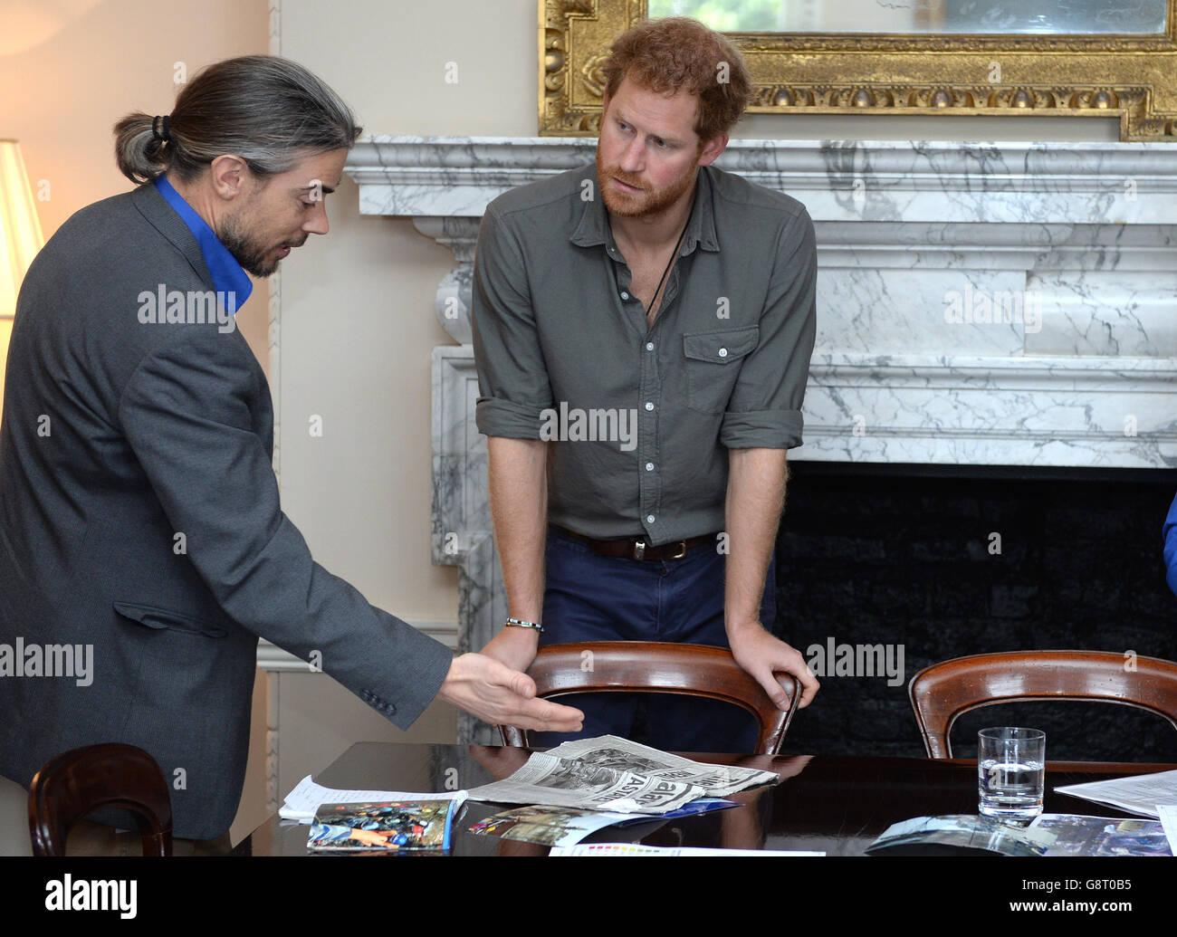 Prince Harry, royal patron of MapAction, speaks with volunteer Hamish ...