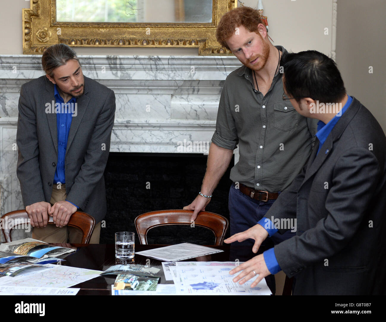 Prince Harry, royal patron of MapAction, speaks with volunteers Hamish ...
