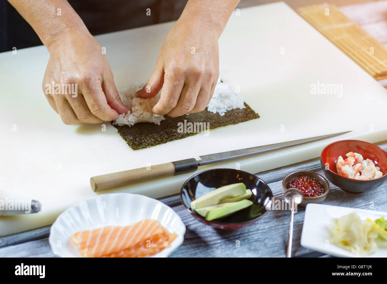 Hands touch white rice Stock Photo - Alamy