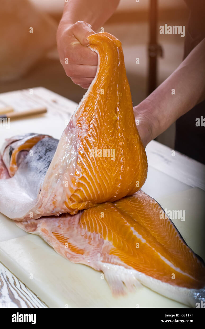 Holding raw fish hi-res stock photography and images - Alamy