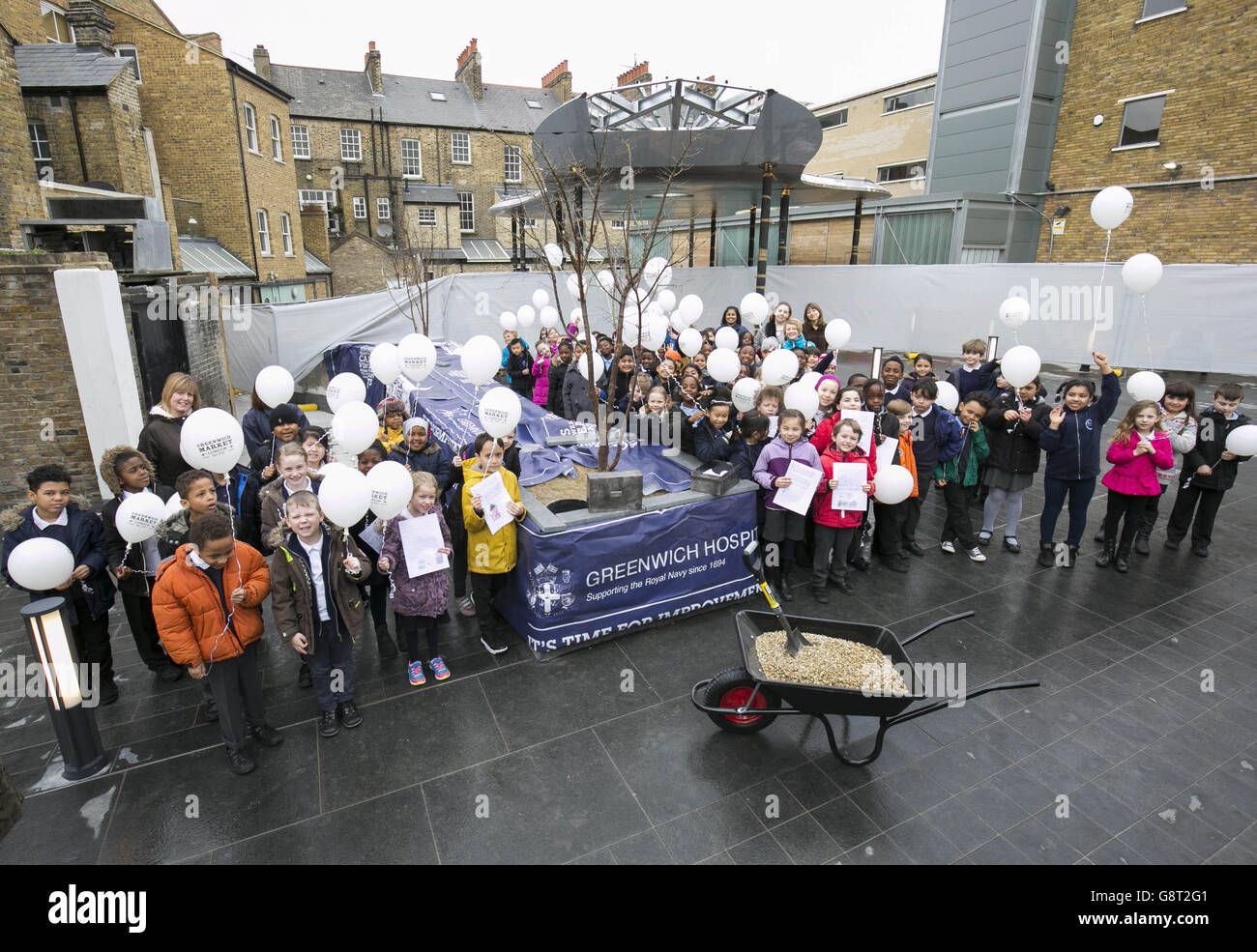 Local children from the James Wolfe Primary School with Centre for the Deaf bury a time capsule ...