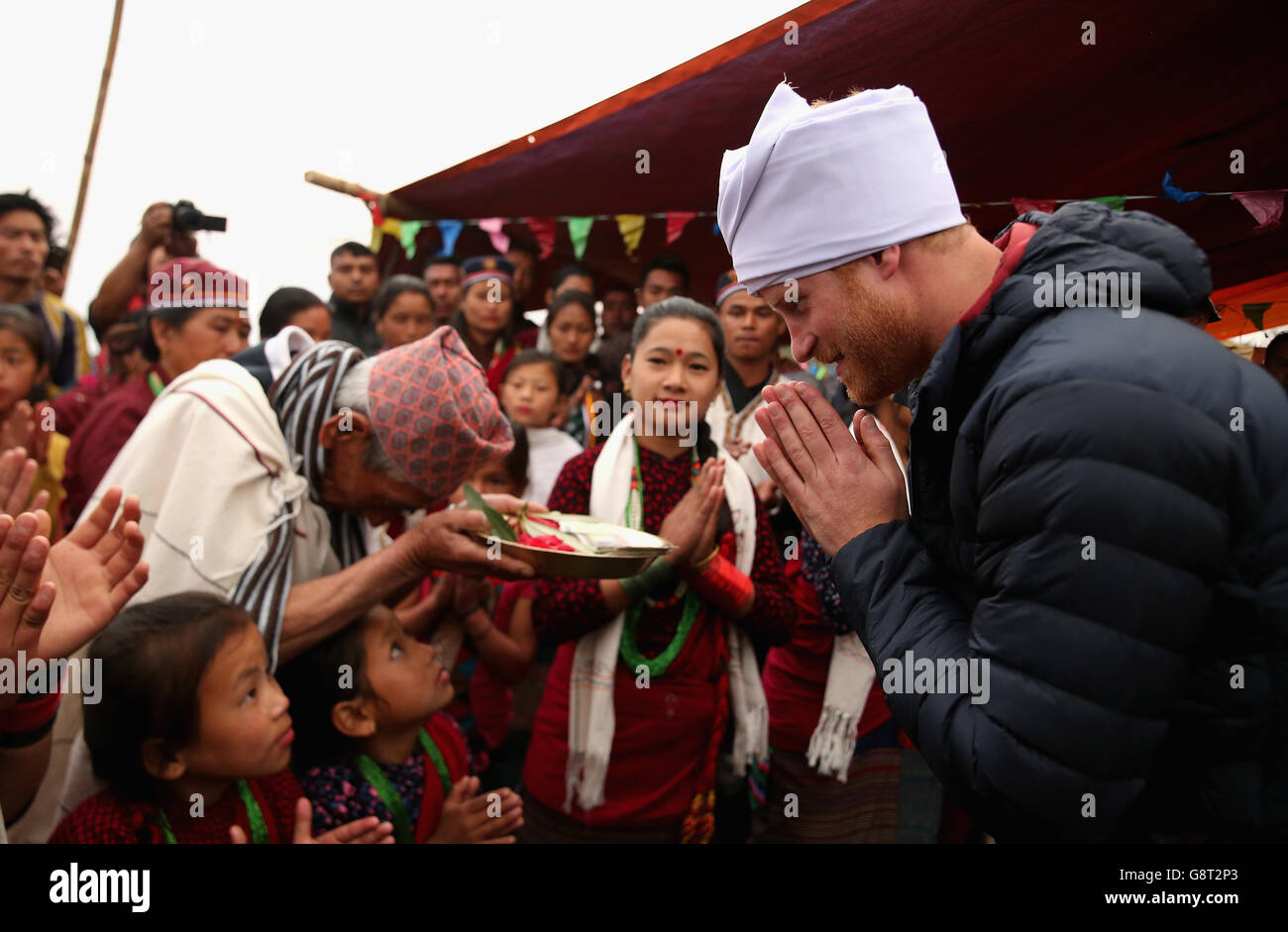 Prince Harry wearing a pheta turban after being given the honour of ...