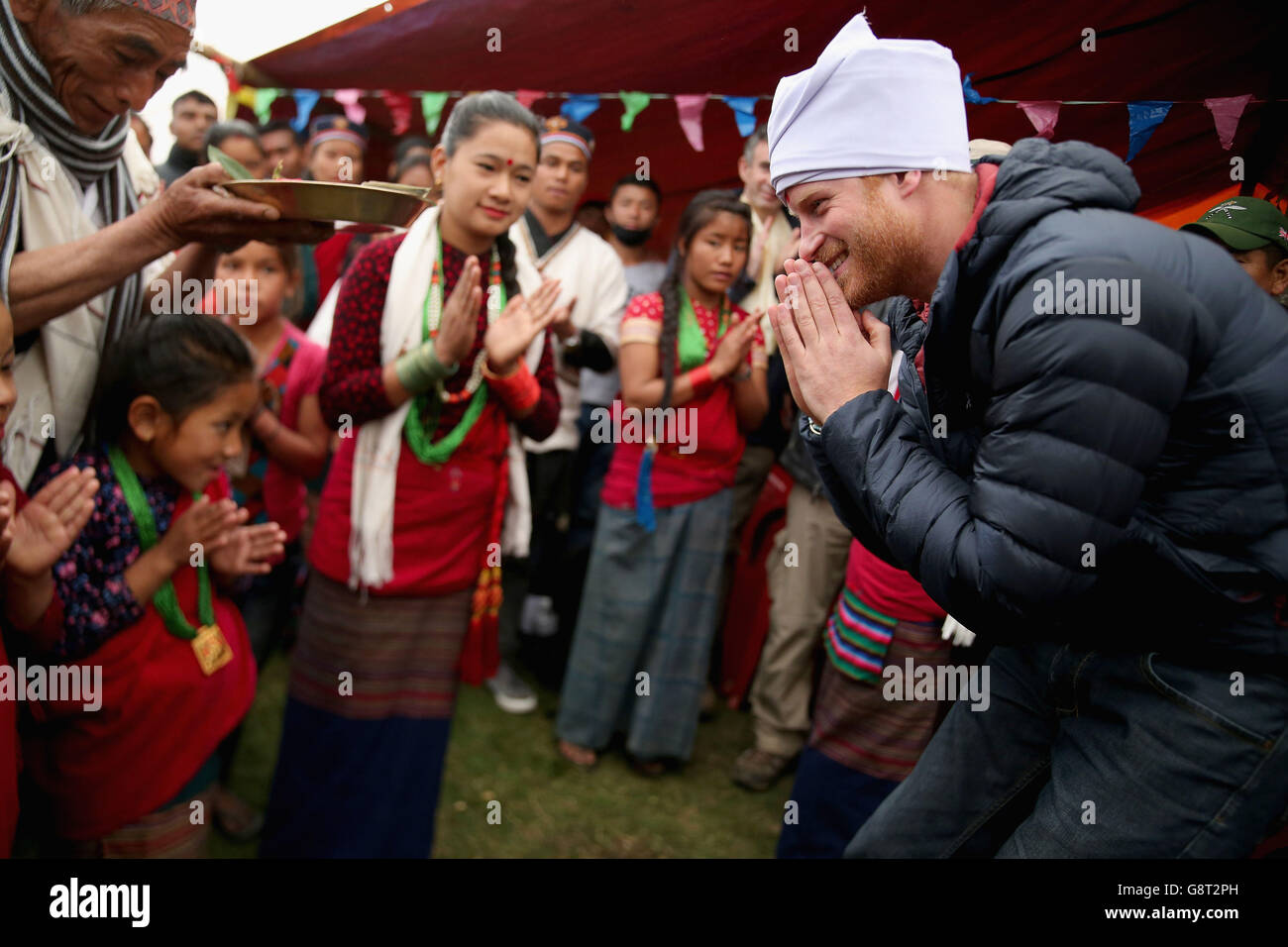 Prince Harry wearing a pheta turban after being given the honour of ...