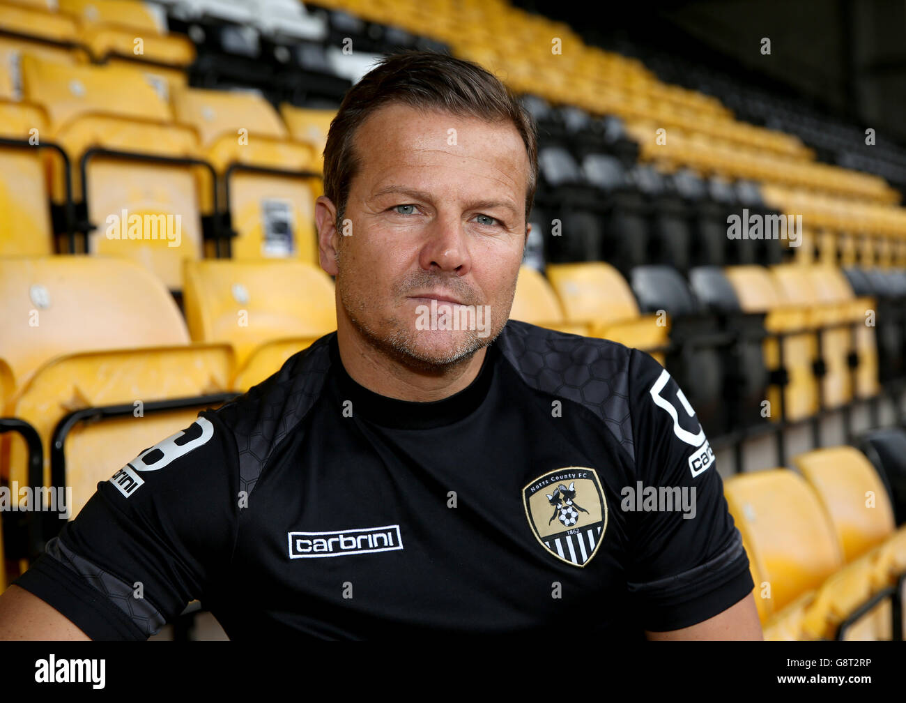 Notts county manager mark poses photographs after press conference lane ...
