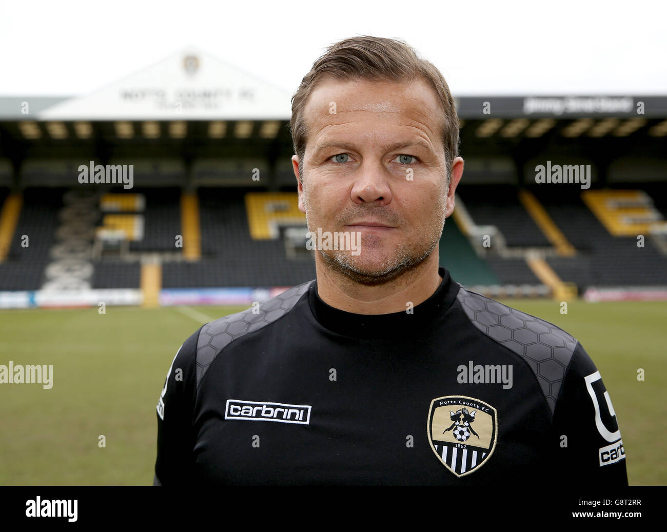 Notts county manager mark poses photographs after press conference lane ...