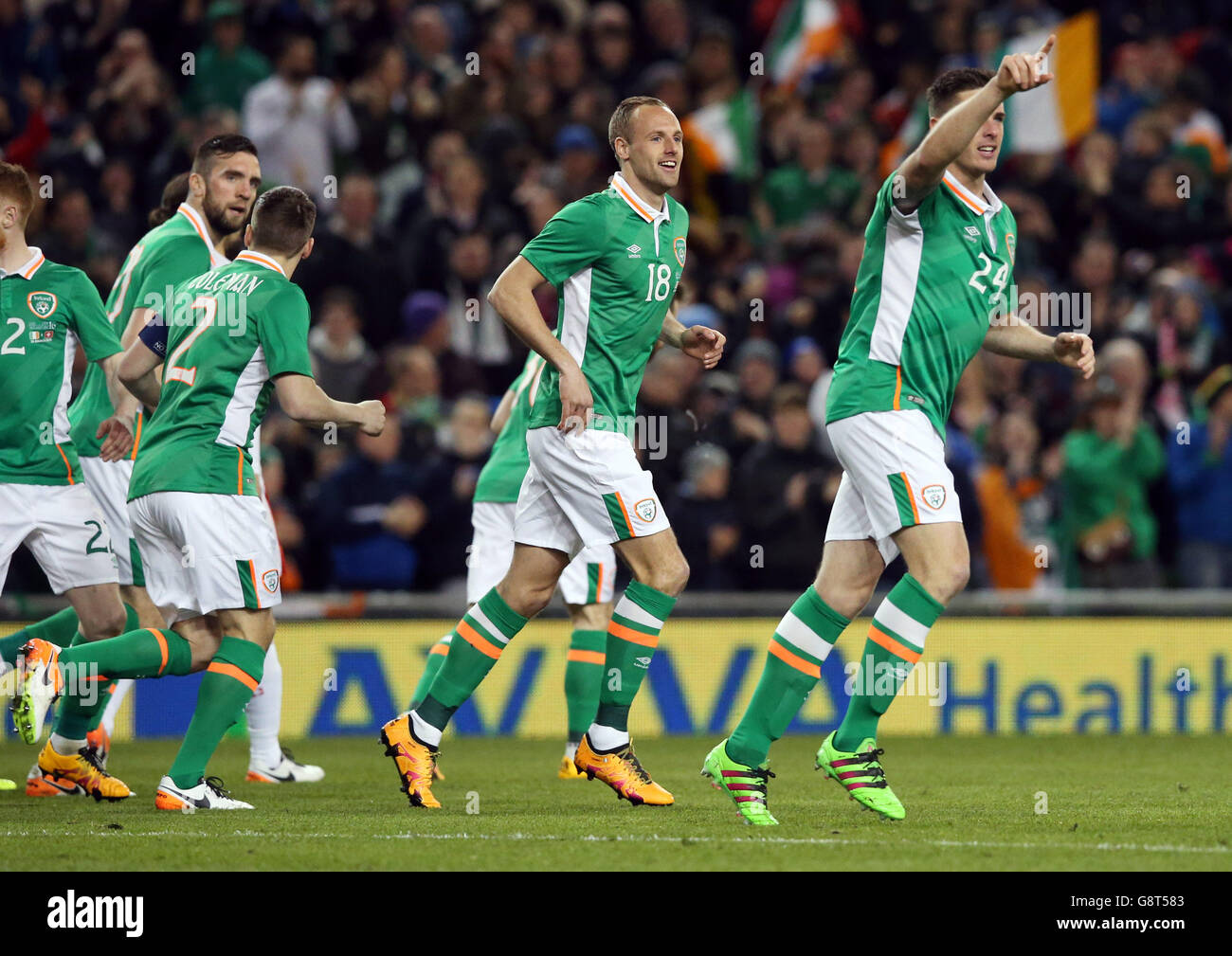 Republic of Ireland's Ciaran Clark (right) celebrates scoring his side ...
