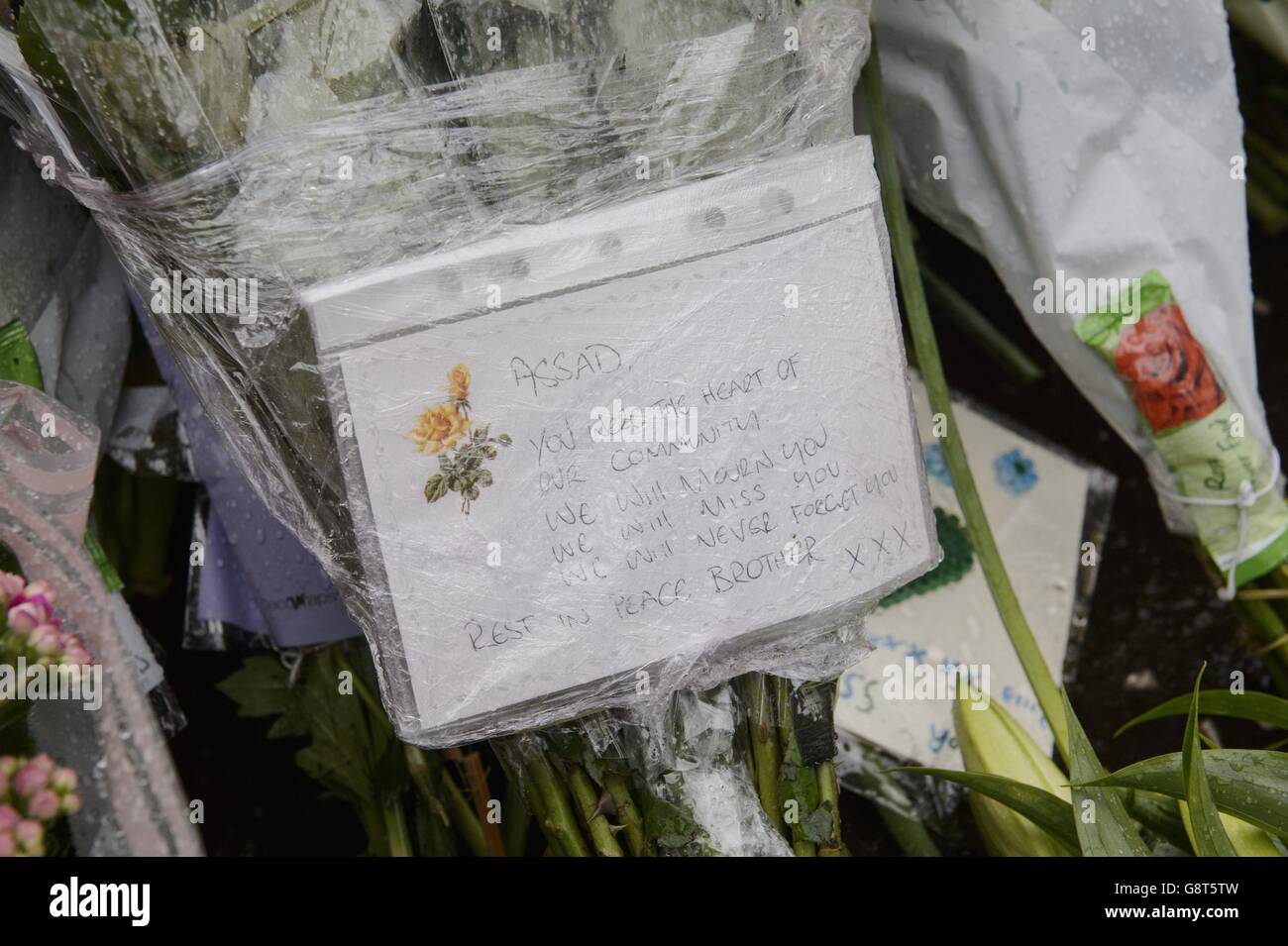 Tributes left to Asad Shah outside his shop in Shawlands, Glasgow, as a ...