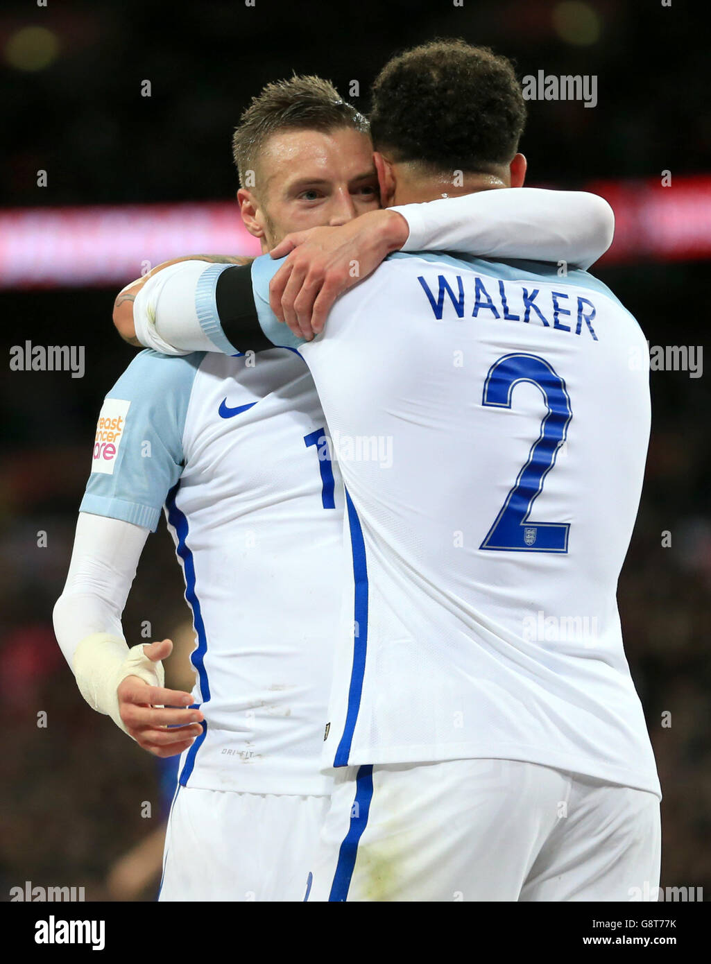 England's Jamie Vardy (left) celebrates scoring his side's first goal ...