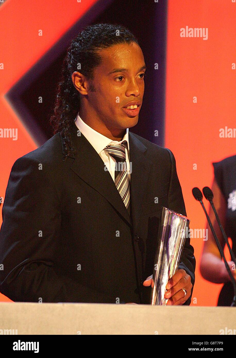 Ronaldinho of Barcelona and Brazil receives his award at the Mastercard ...