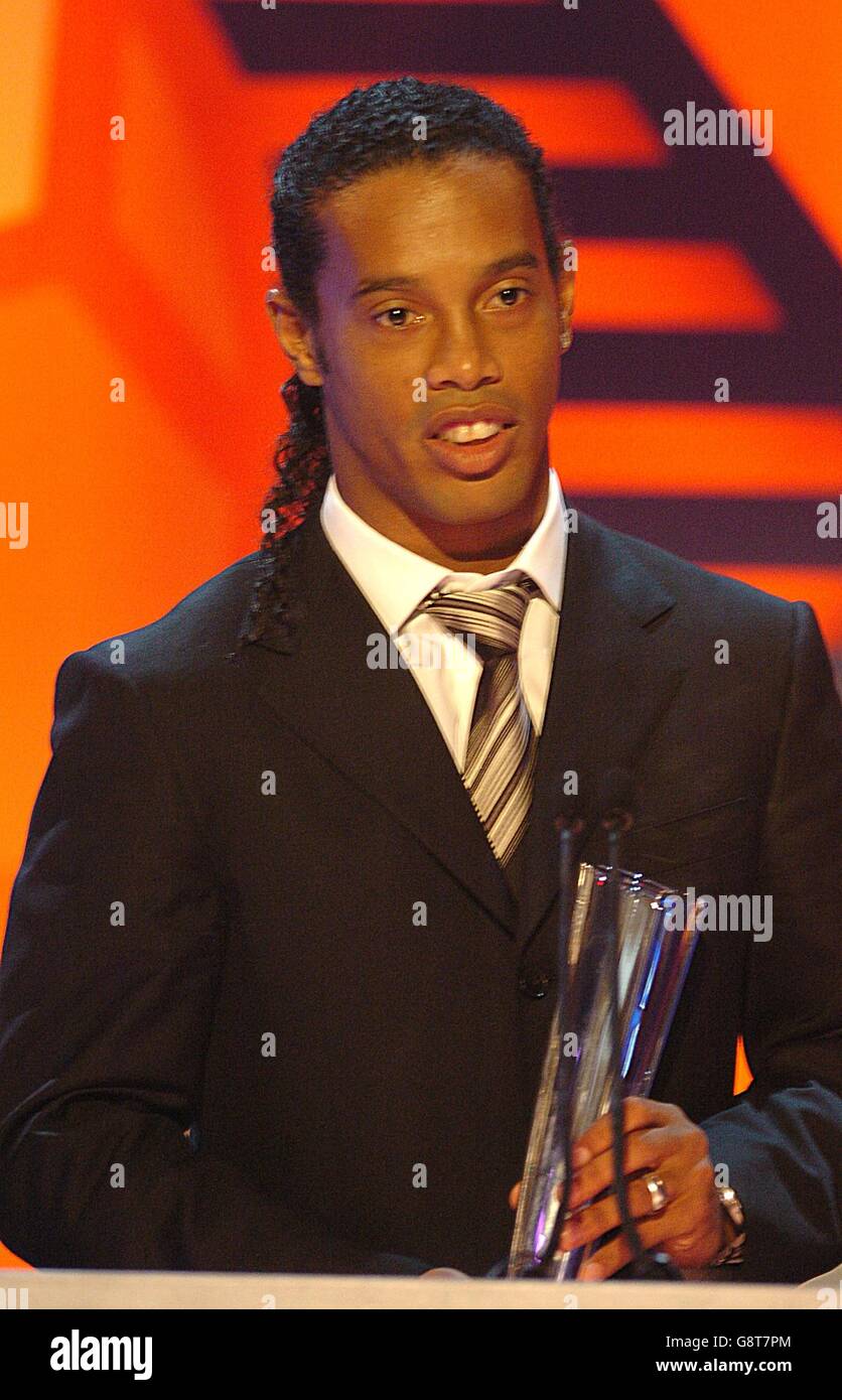 Ronaldinho of Barcelona and Brazil receives his award at the Mastercard ...