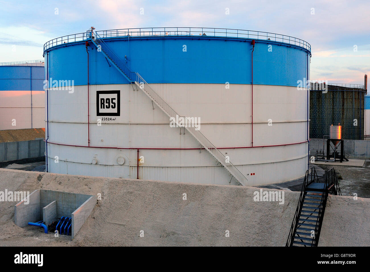 French oil refinery in Fos on sea beside Marseille. Tanks of storage ...