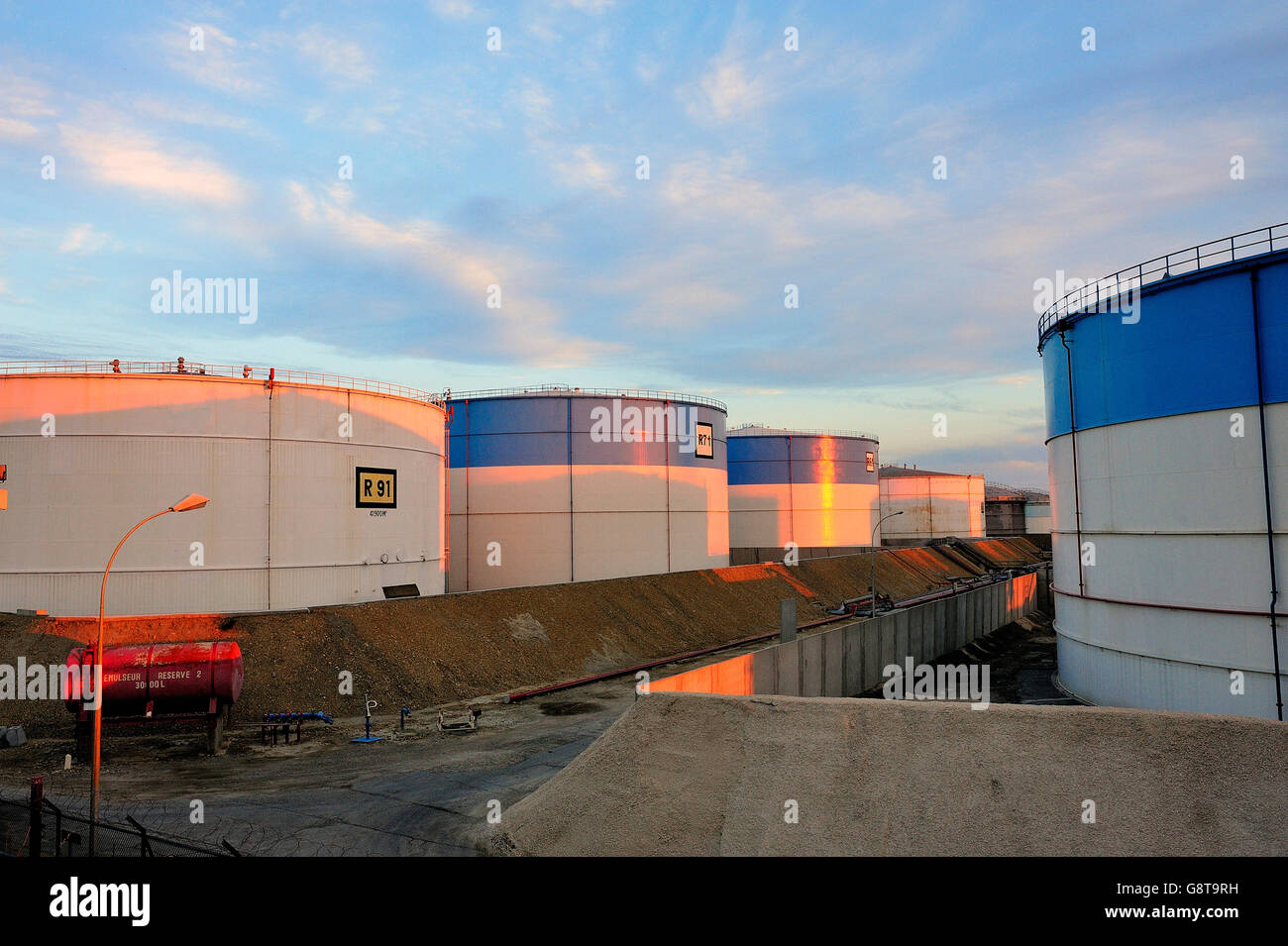 French oil refinery in Fos on sea beside Marseille. Tanks of storage ...