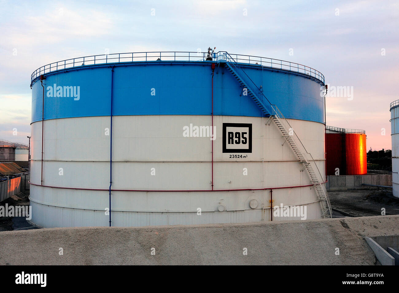 French oil refinery in Fos on sea beside Marseille. Tanks of storage ...