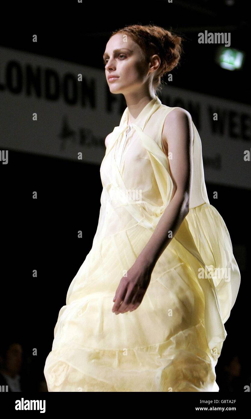 A model wears a creation by designer John Rocha, during his London ...