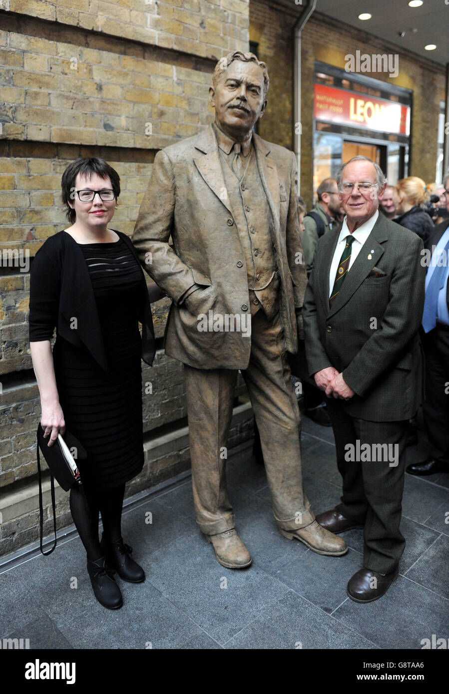 Sculptor Hazel Reeves stands next to her statue of the railway engineer ...