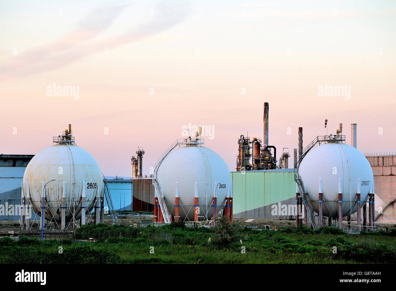 French oil refinery in Fos on sea beside Marseille. Tanks of storage ...
