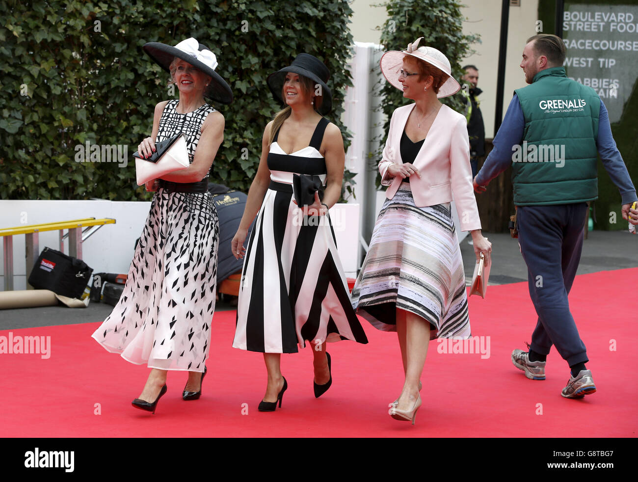 Female racegoers arrive for Ladies Day of the Crabbie's Grand National ...