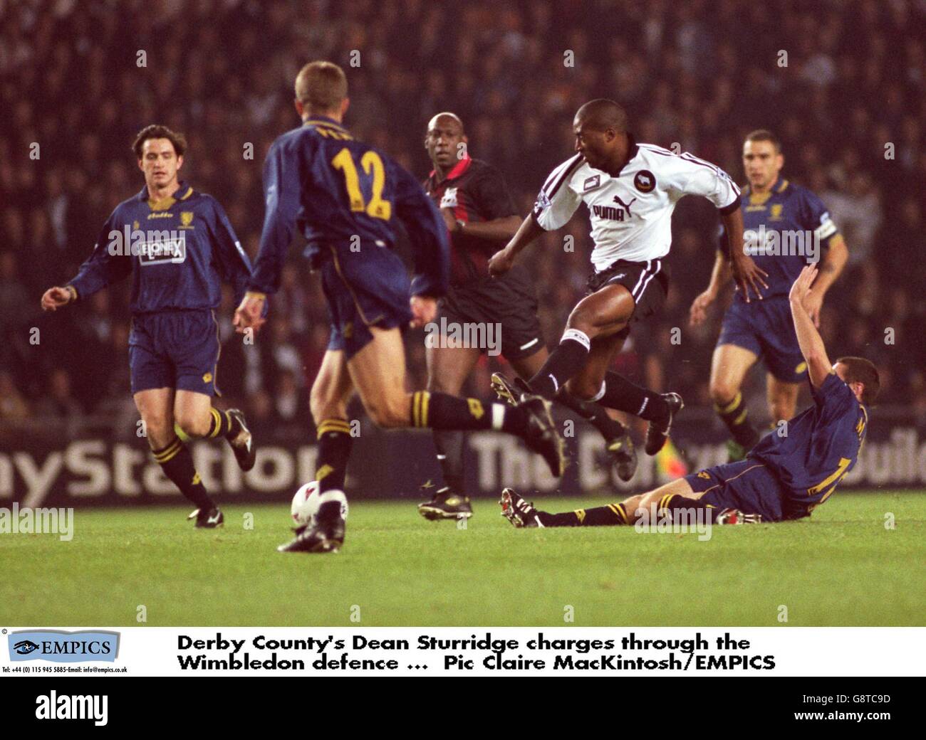 Derby countys dean sturridge right charges through the wimbledon ...
