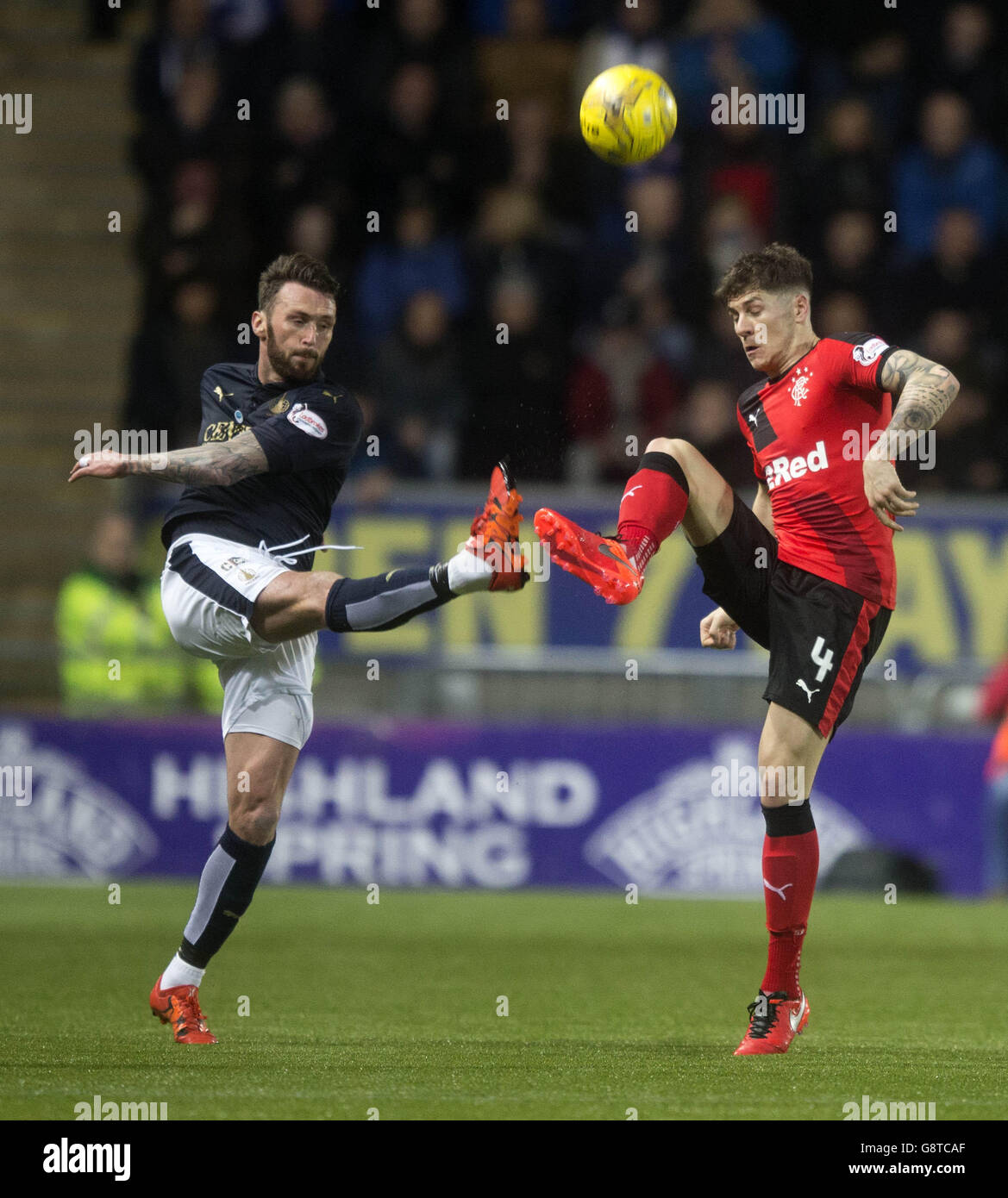 Rangers' Rob Kiernan (right) and Falkirk's Lee Miller battle for the ...
