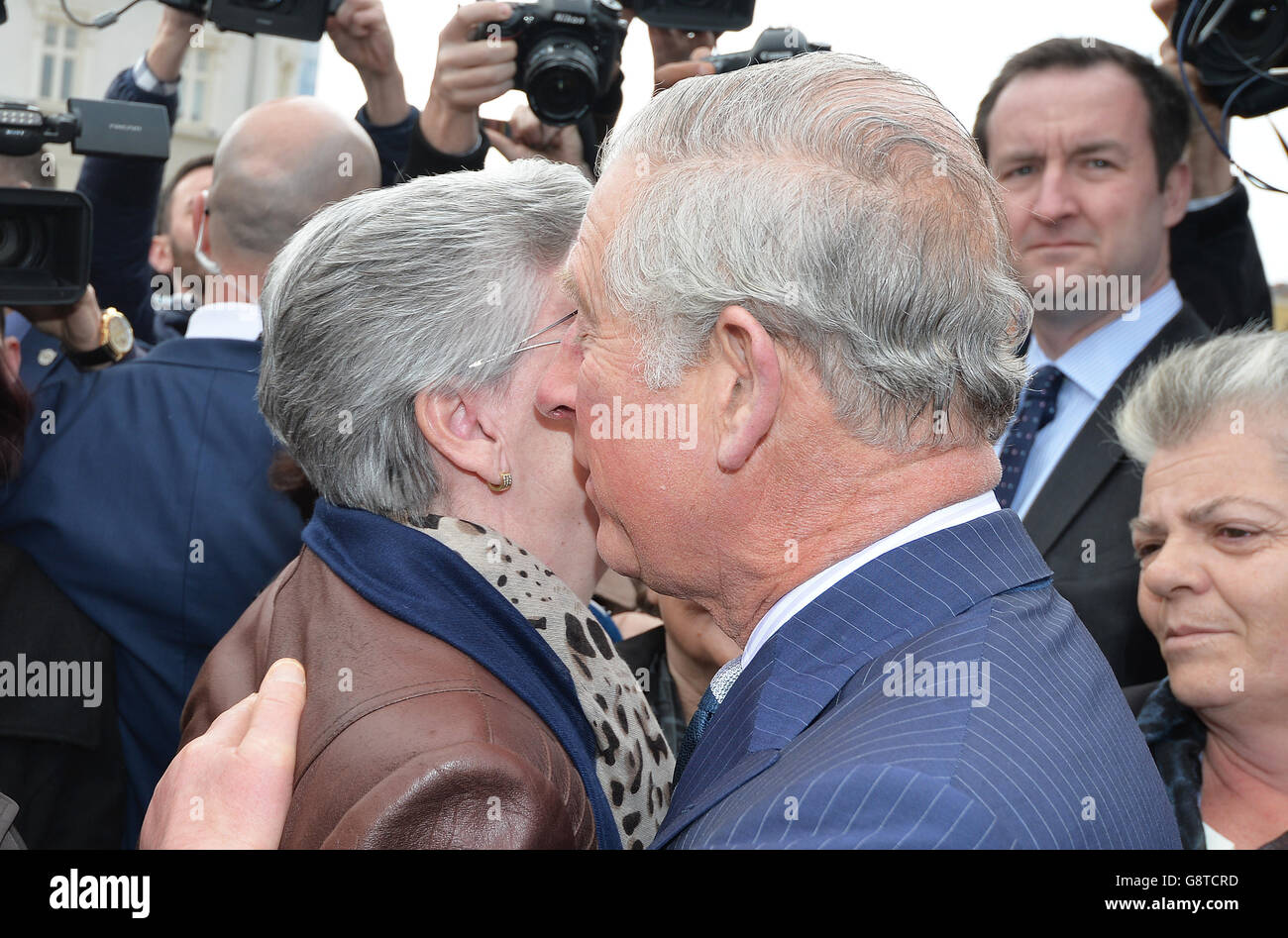 The Prince of Wales embraces the families of Kosovan people who have ...