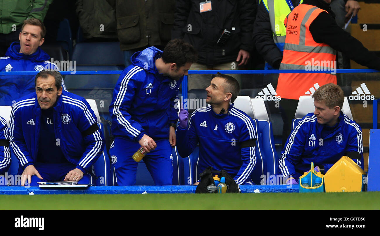 Chelsea physio Jon Fearn (centre right) returns to the bench before the ...