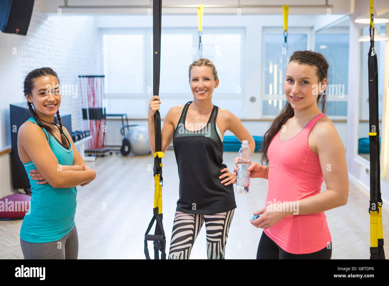 Women in exercise class taking a break Stock Photo - Alamy