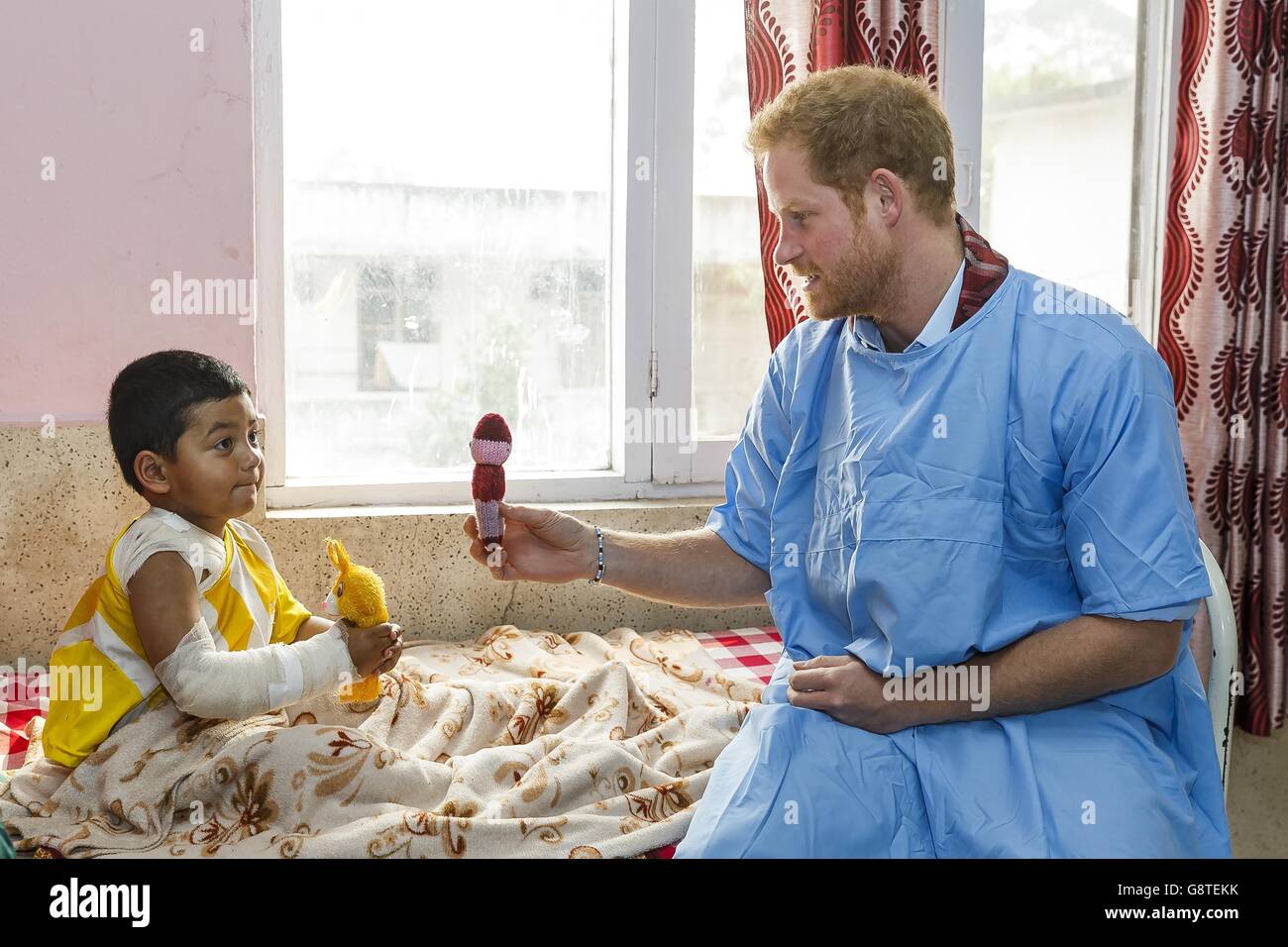 Prince Harry meets Biplov Puri aged 4 during a visit to Kanti Children ...