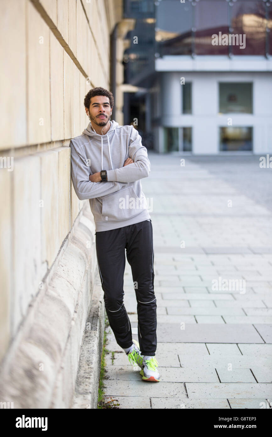 Man leaning against wall hi-res stock photography and images - Alamy