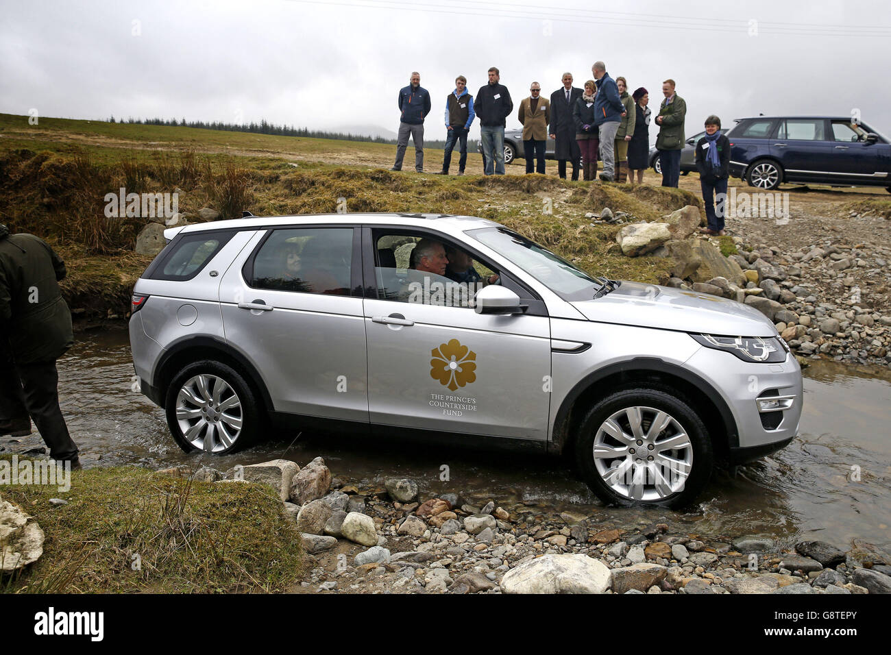 Prince charles driving car hi-res stock photography and images - Alamy