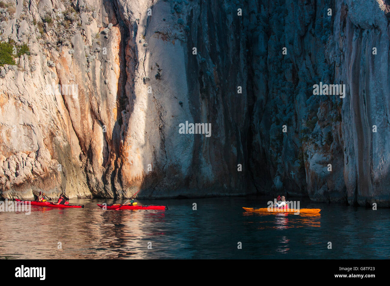 Men next to the rock formation hi-res stock photography and images - Alamy