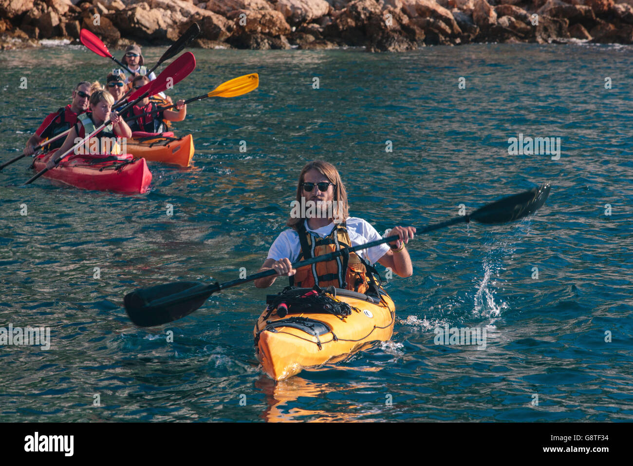Group of people kayaking Stock Photo - Alamy
