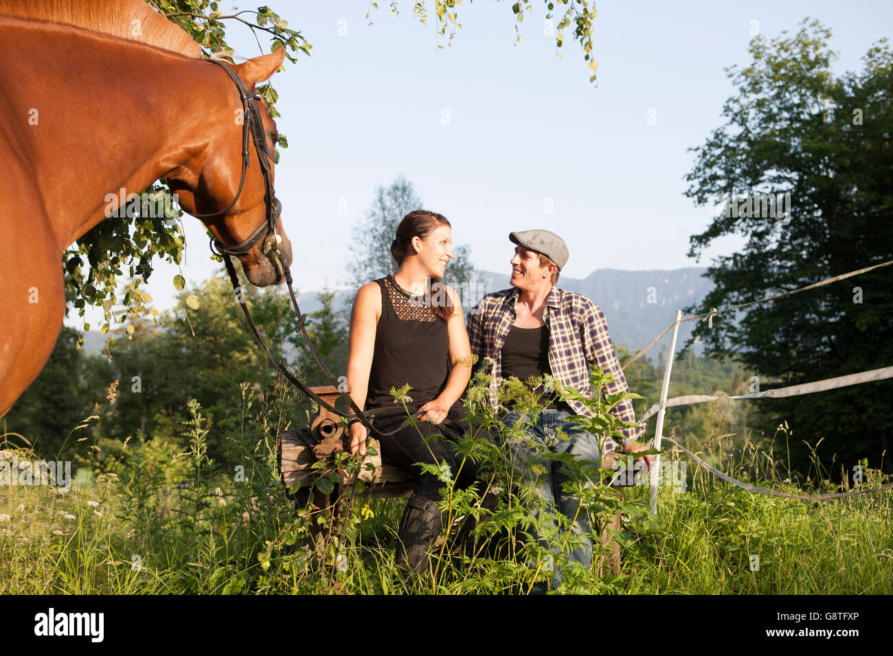 Couple on horse hi-res stock photography and images - Alamy