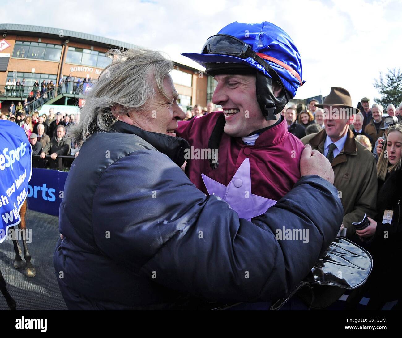 Jockey Ger Fox celebrates with trainer Mouse Morris after winning the ...