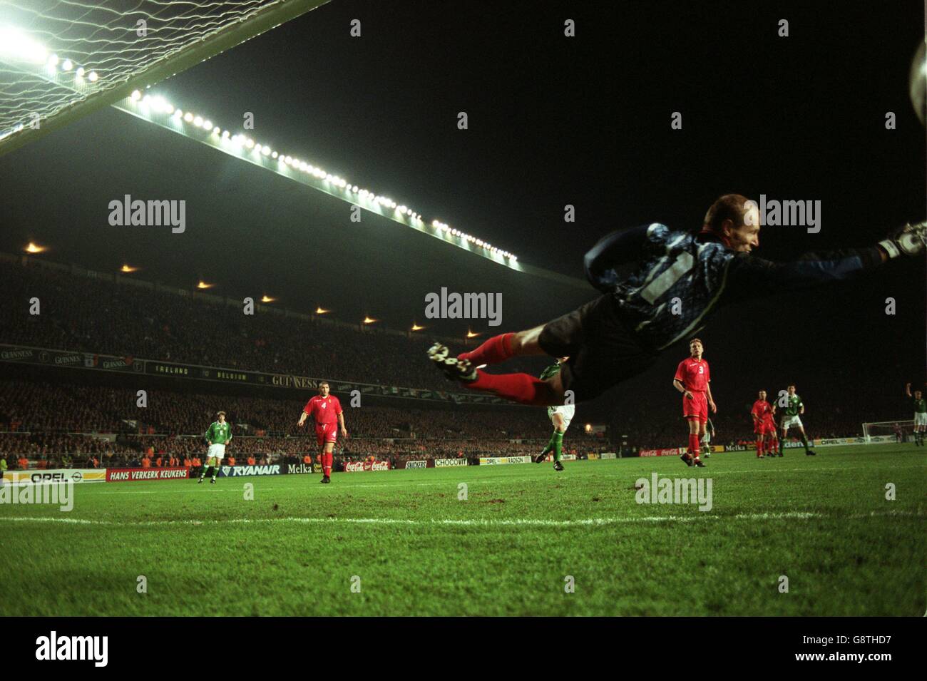 Belgium's goalkeeper Filip de Wilde's dive is not enough to prevent ...