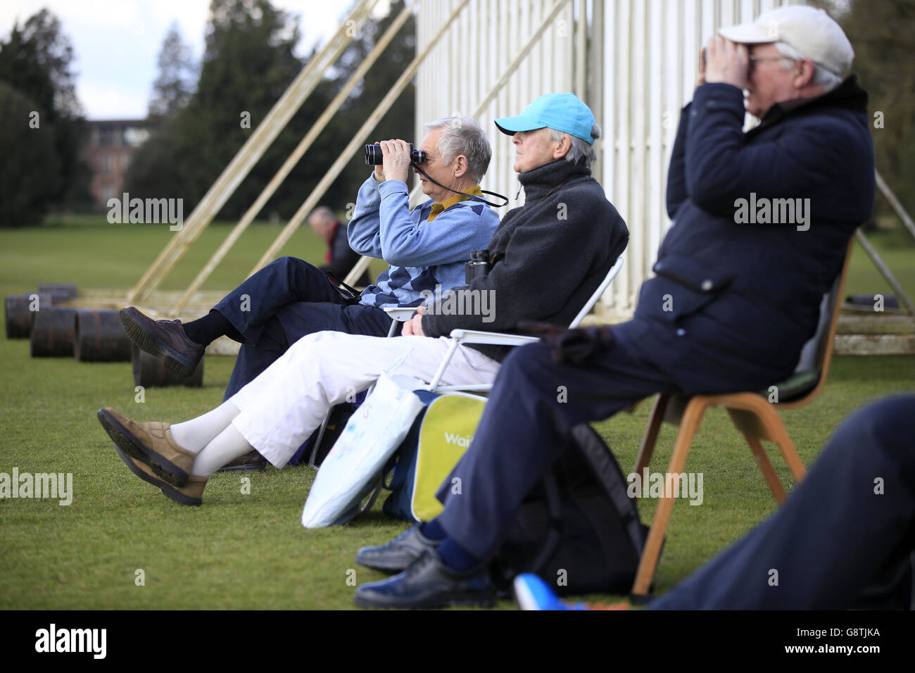 Spectators watch play during day one of the First Class match between ...