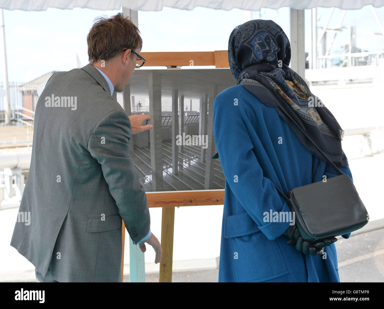 The Princess Royal looks at a picture with Steve Fraser of United ...