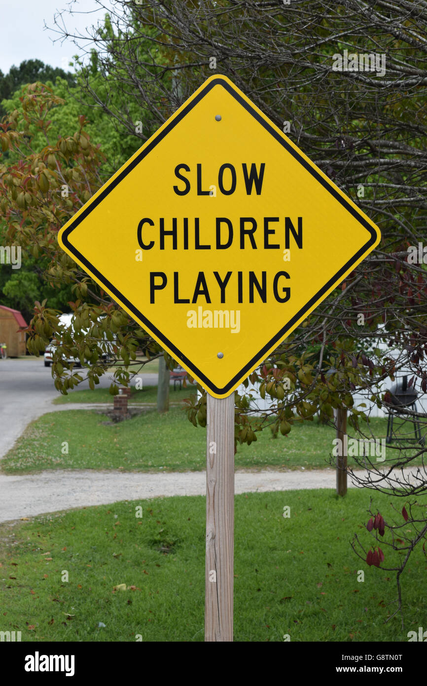 A sign warning of children playing in the street Stock Photo - Alamy
