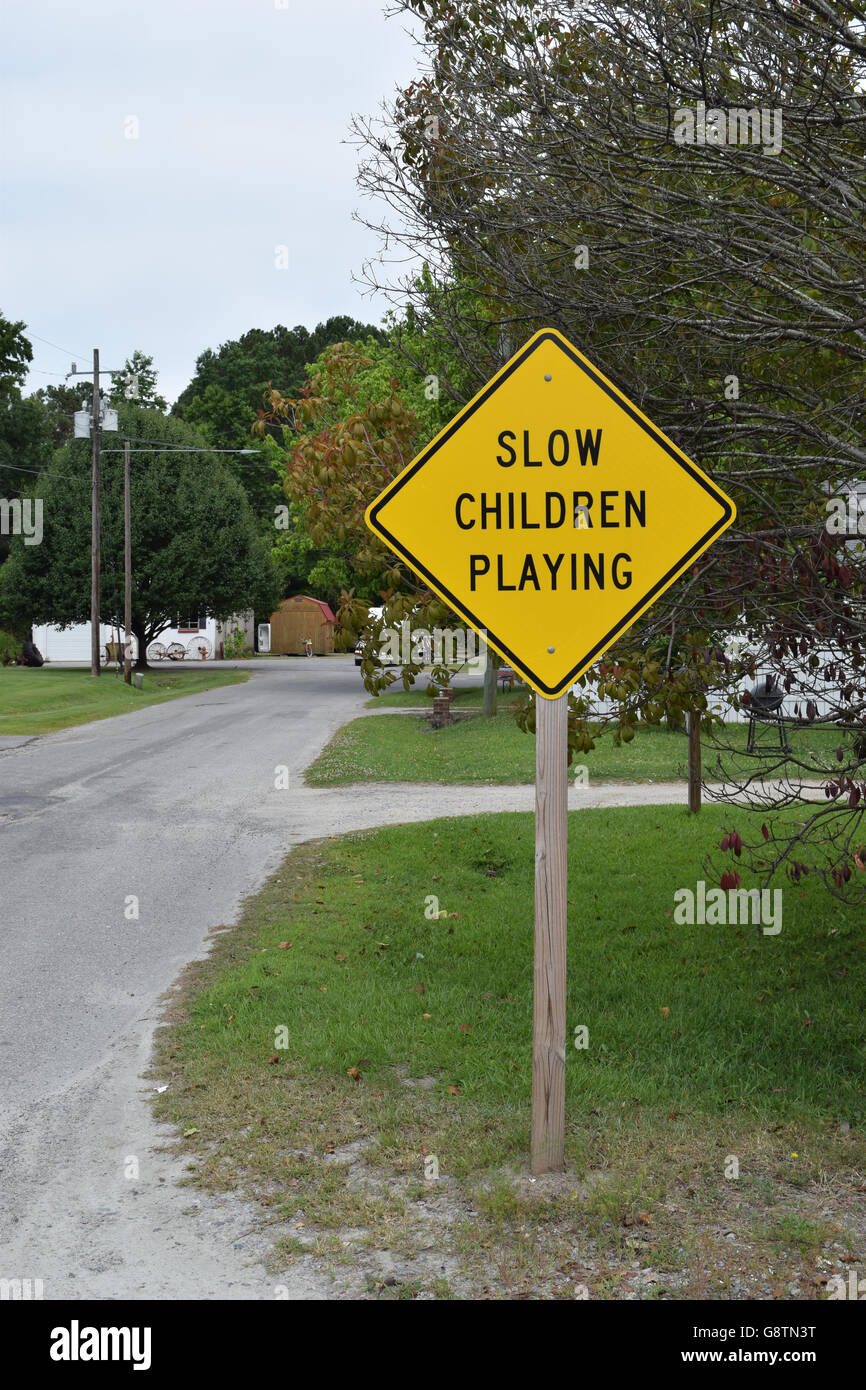 A sign warning of children playing in the street Stock Photo - Alamy